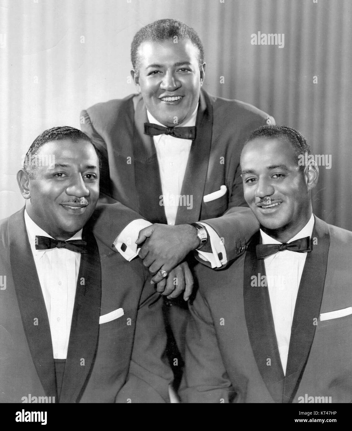 The Mills Brothers, a renowned American vocal group, performed popular ...