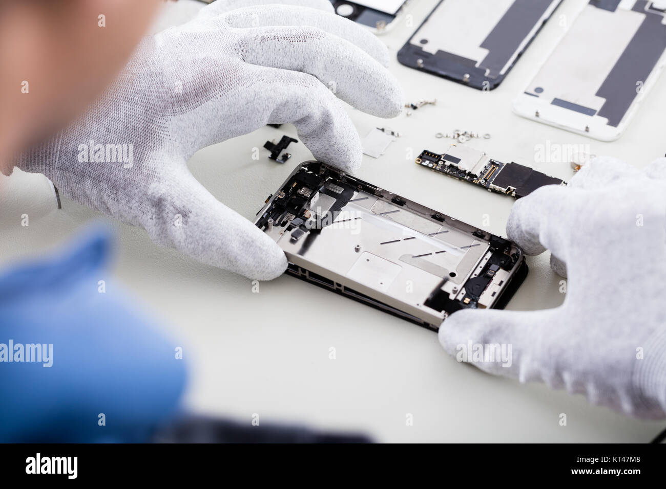 Technician Repairing Mobile Phone Stock Photo - Alamy