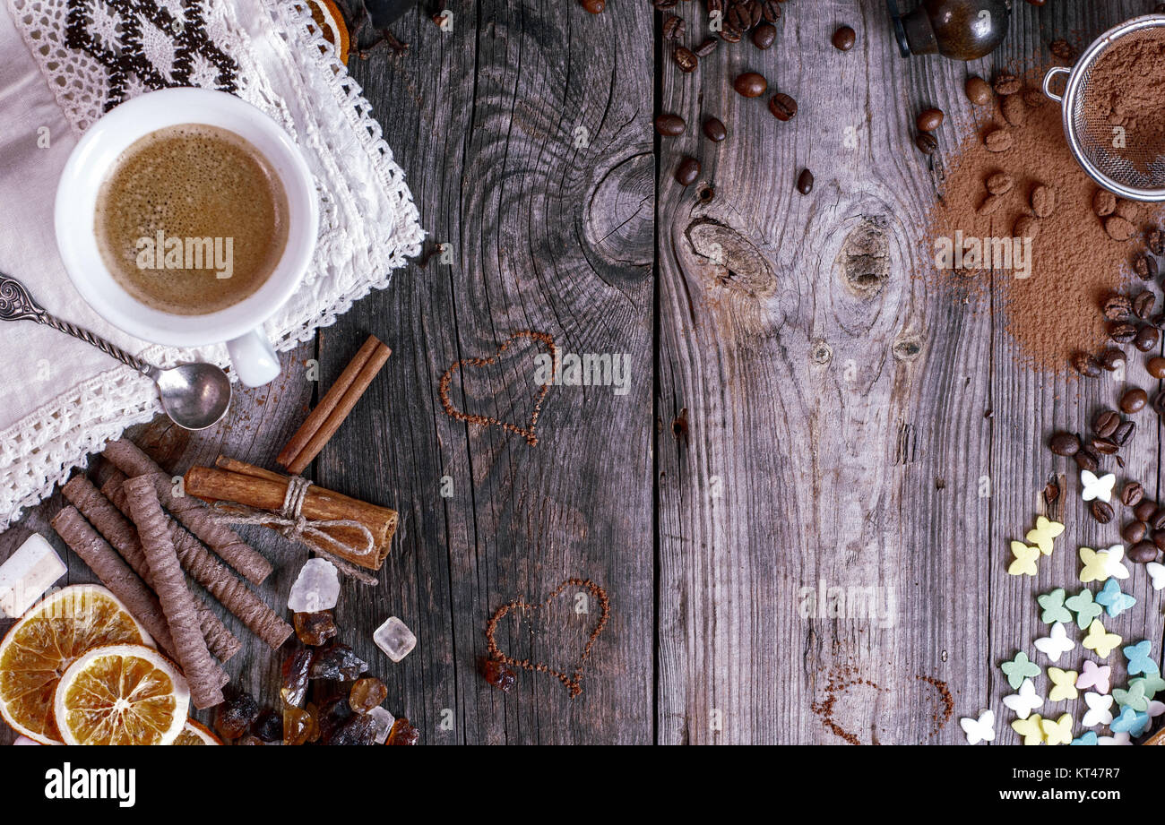 Grey wooden background with black coffee Stock Photo - Alamy