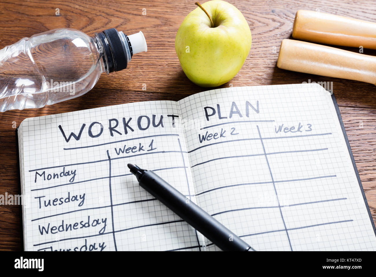 Workout Plan In Notebook Stock Photo - Alamy
