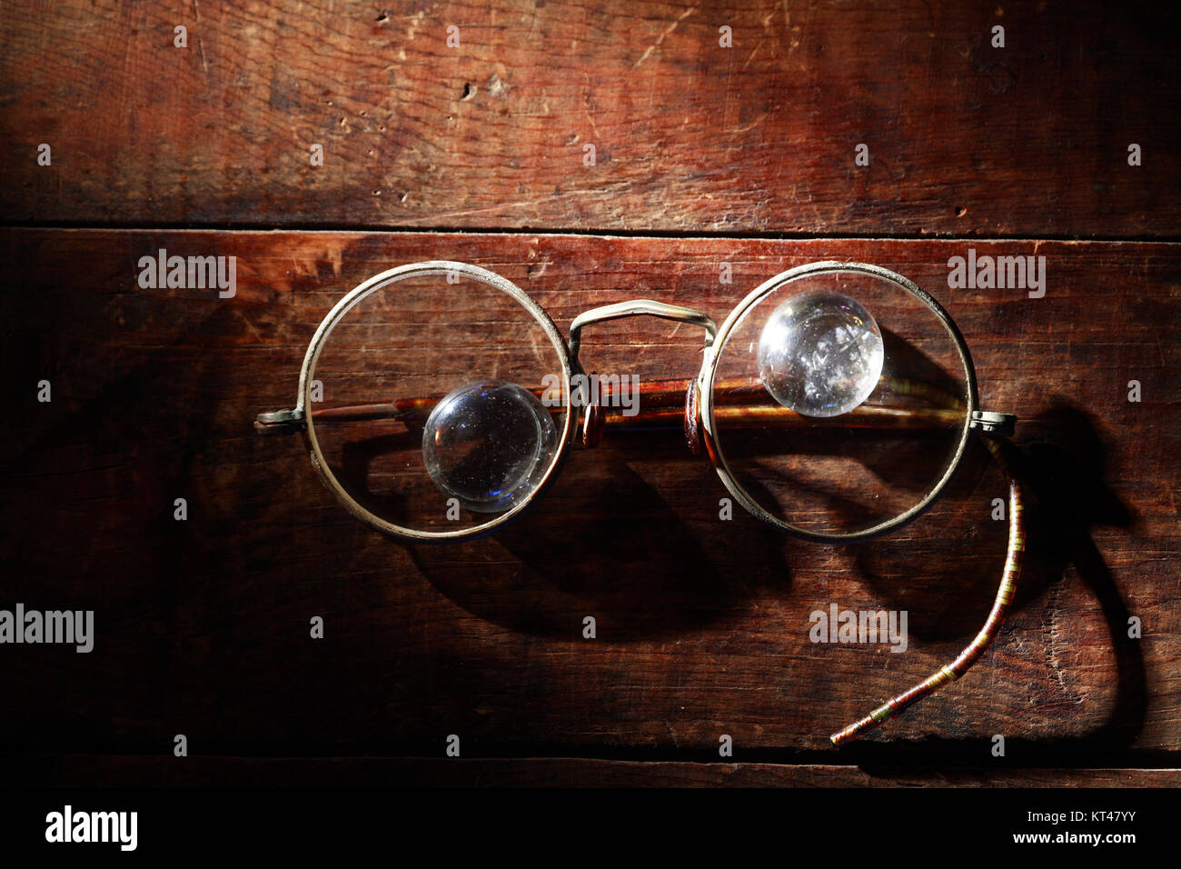 Old stylish spectacles closeup on wooden background Stock Photo - Alamy
