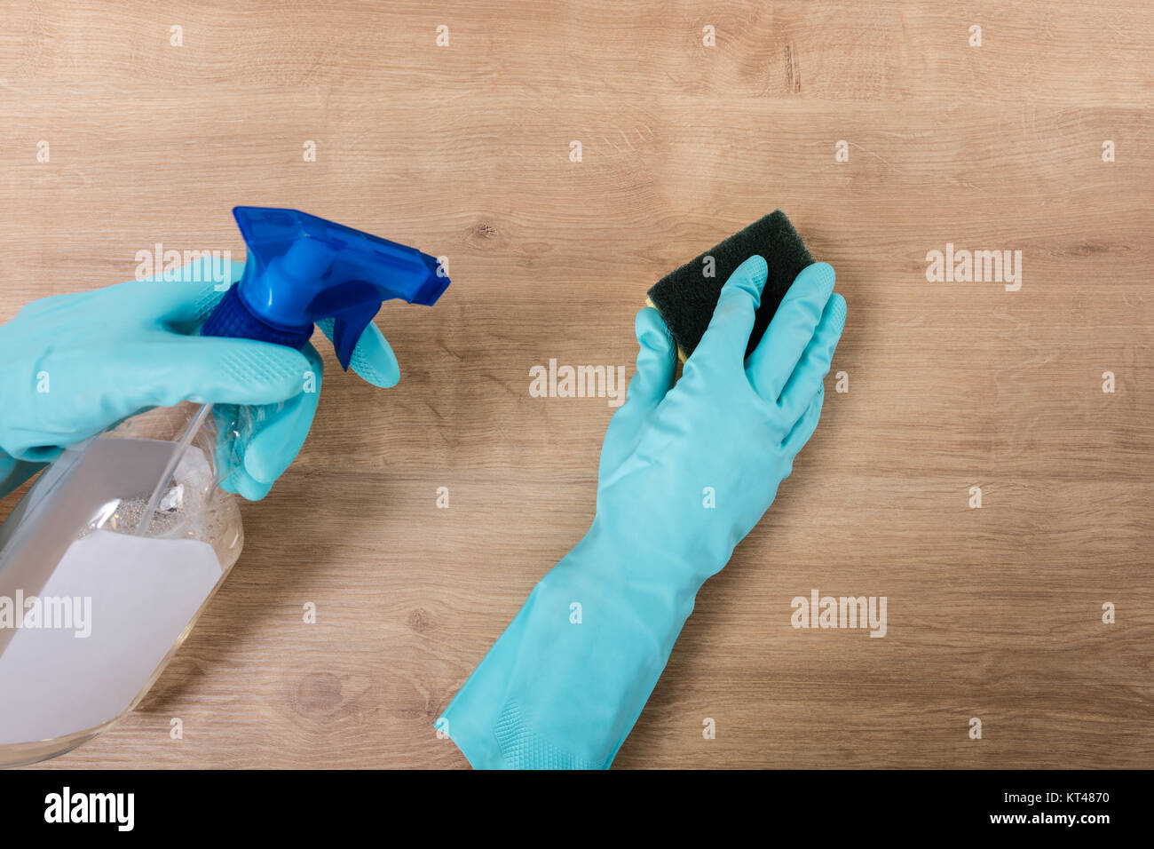 Person Wearing Glove Cleaning Kitchen Worktop Stock Photo - Alamy