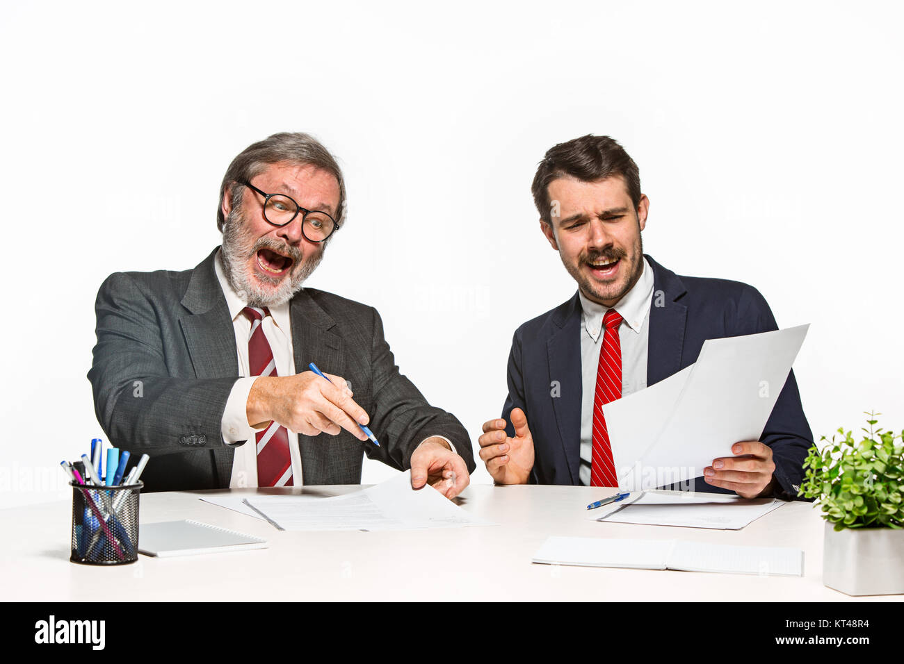 The two colleagues working together at office on white background Stock ...