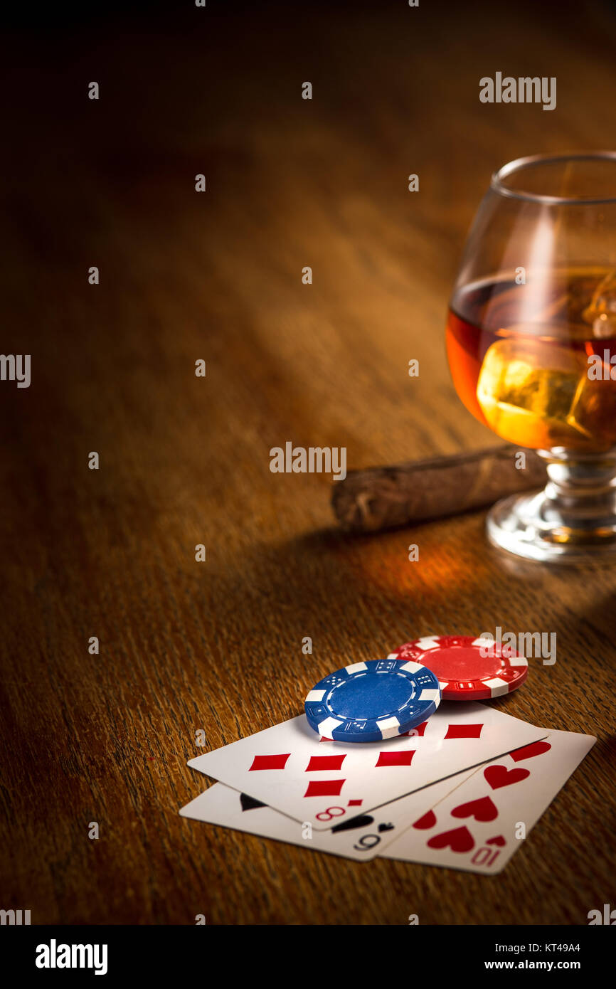 Cigar, chips for gamblings, drink and playing cards Stock Photo - Alamy