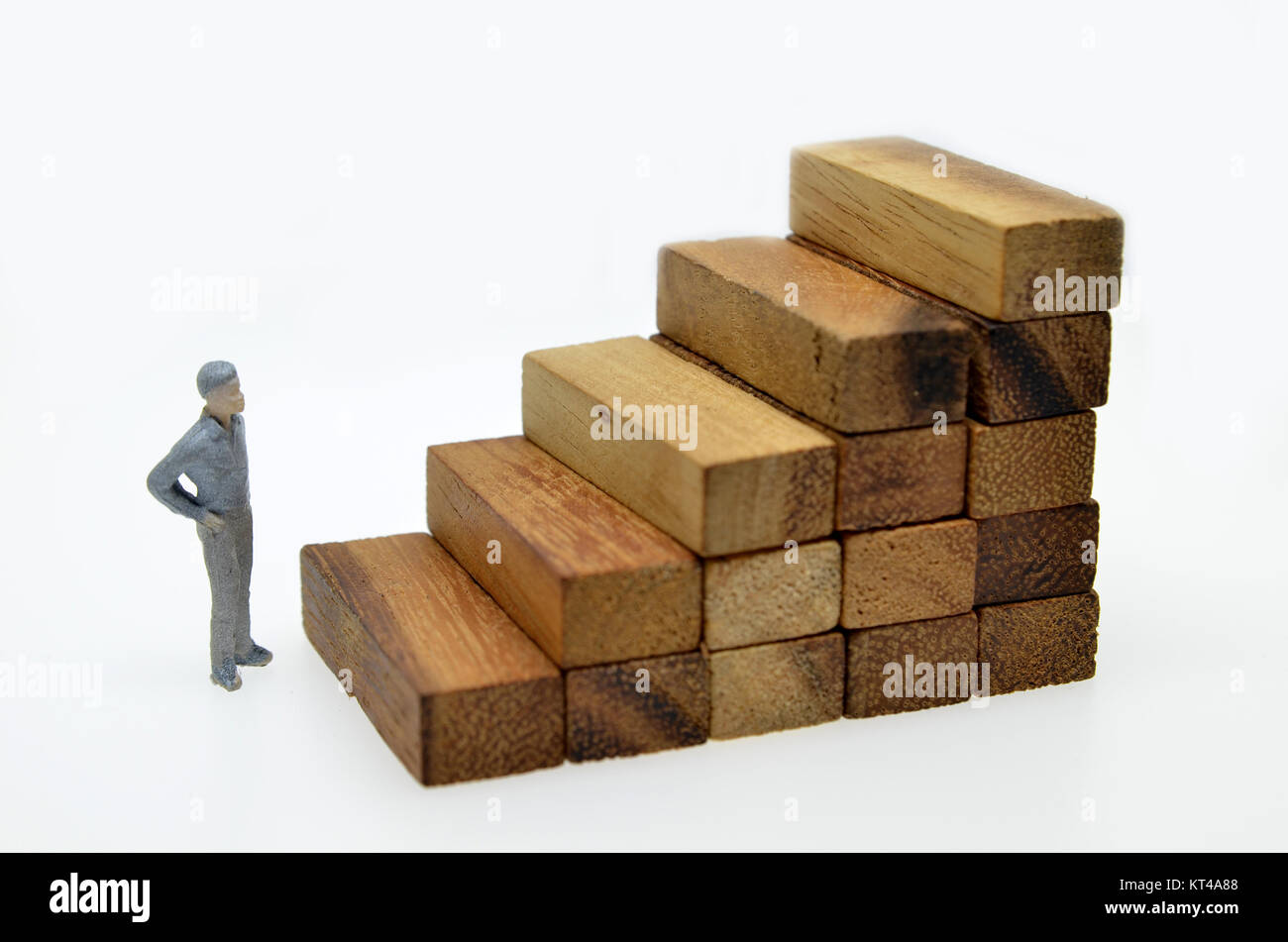 Way to success with businessman and wood block step Stock Photo - Alamy