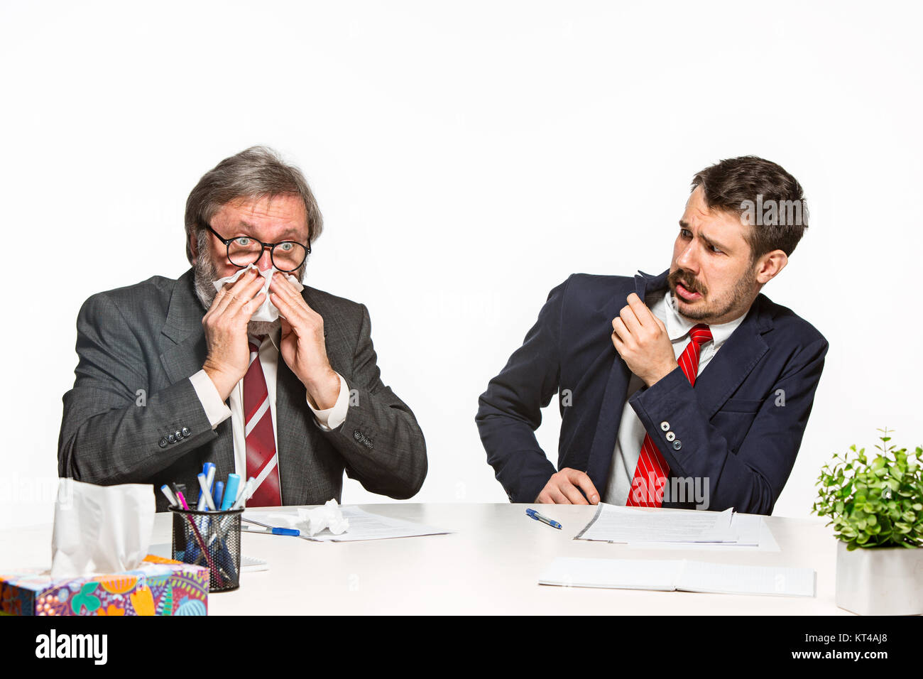 The two colleagues working together at office on white background Stock ...