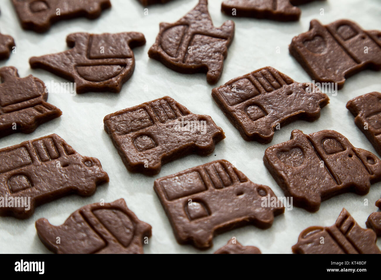 cutting cookies dough cars shape. homemade bakery Stock Photo - Alamy