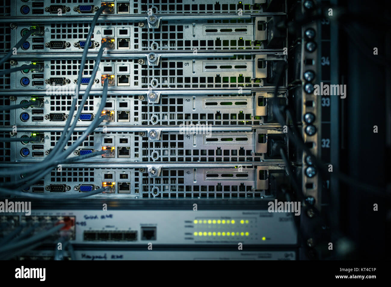 Server rack cluster in a data center (shallow DOF color toned image ...