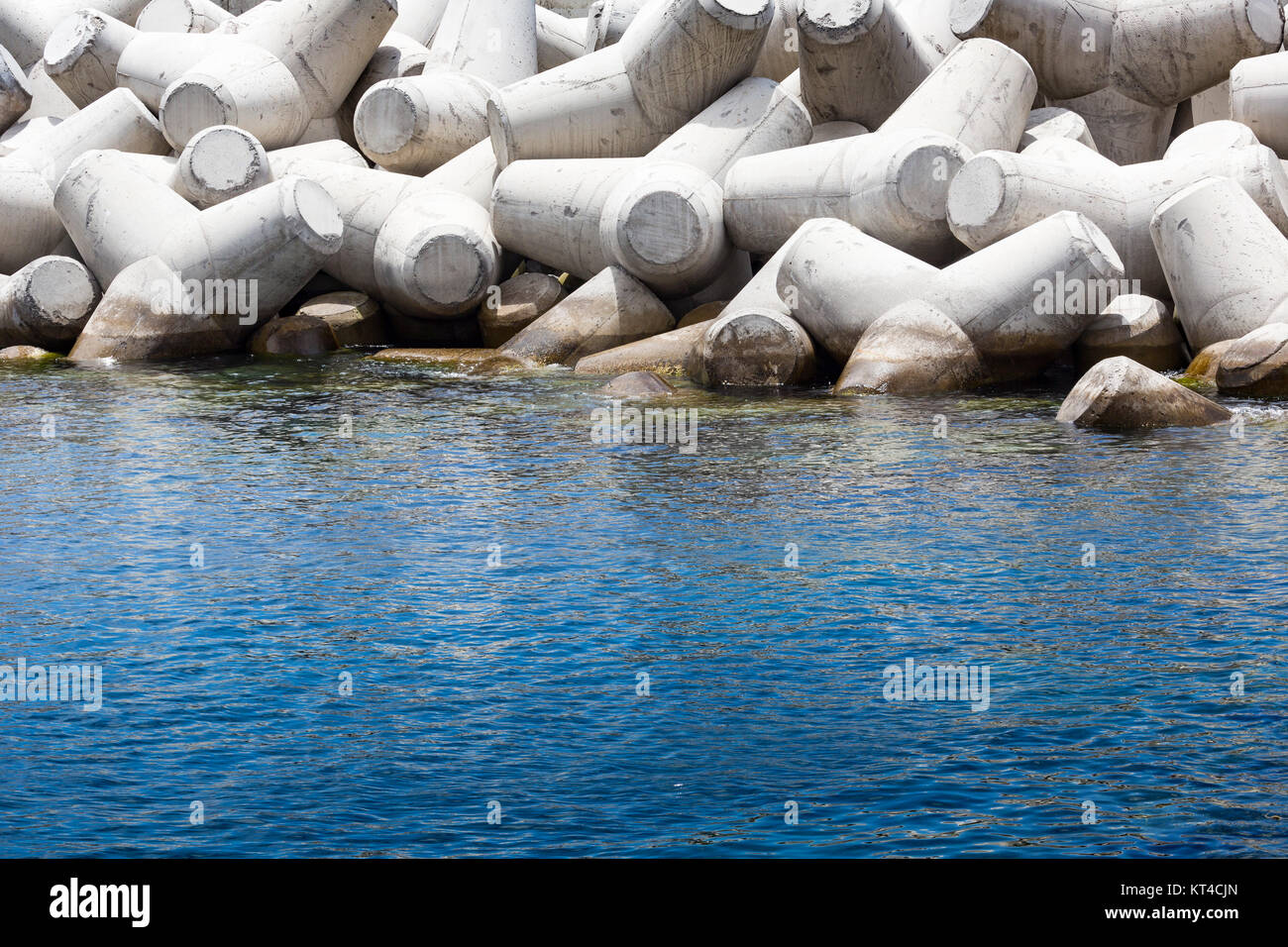 concrete block breakwater hit by the atlantic waves Stock Photo - Alamy