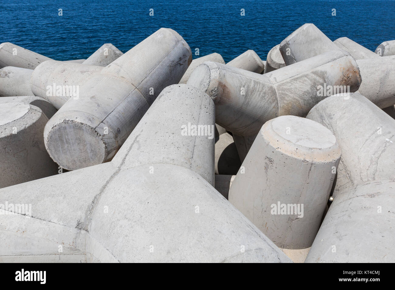 concrete block breakwater hit by the atlantic waves Stock Photo - Alamy