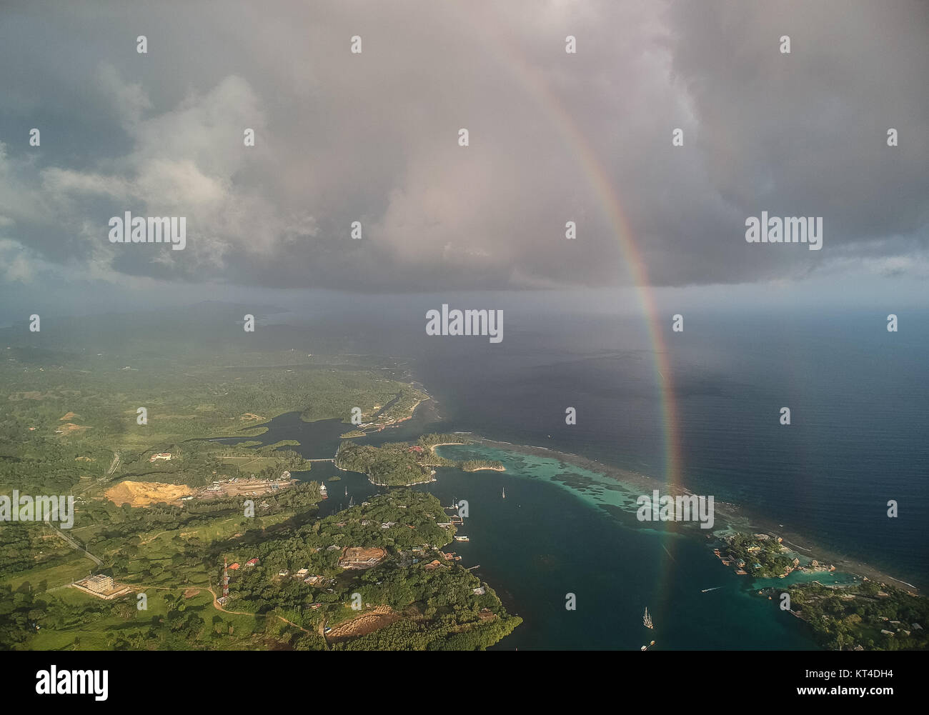 Rainbow Over Caribbean Island Stock Photo - Alamy
