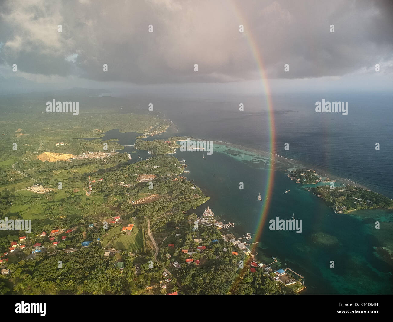 Rainbow Over Caribbean Island Stock Photo - Alamy