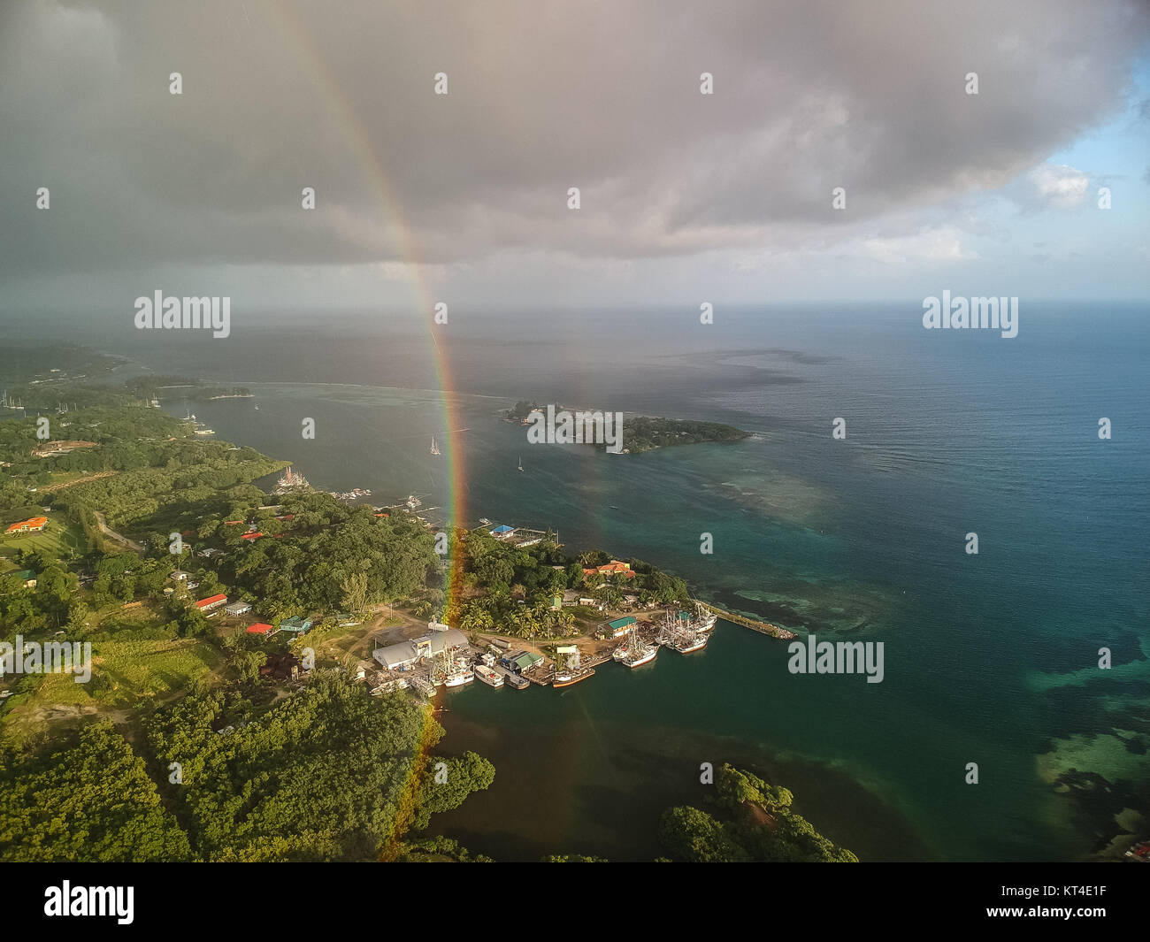 Rainbow Over Caribbean Island Stock Photo - Alamy