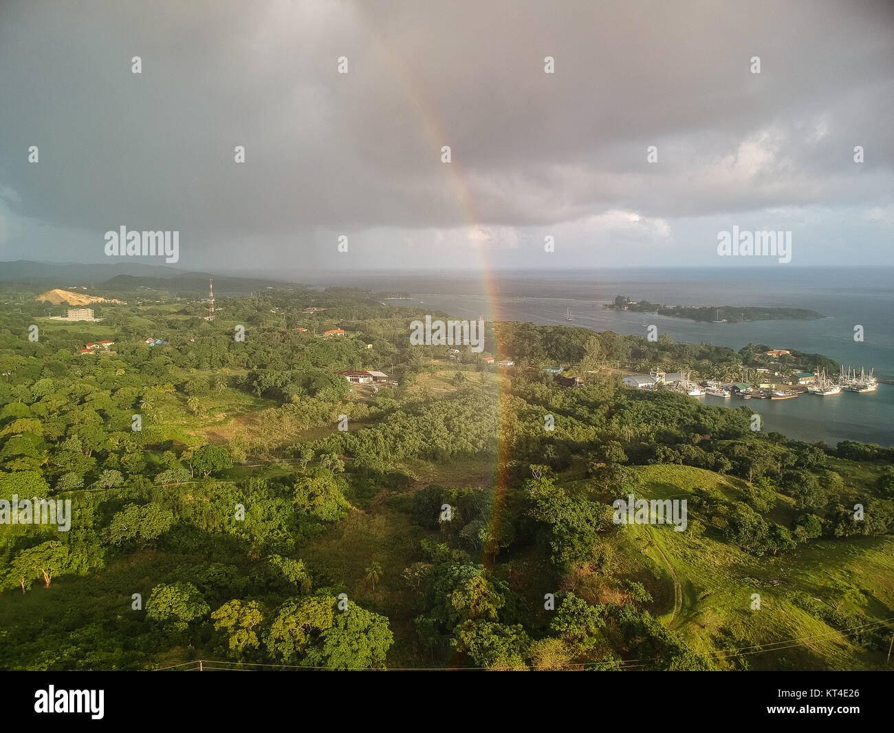 Rainbow Over Caribbean Island Stock Photo - Alamy