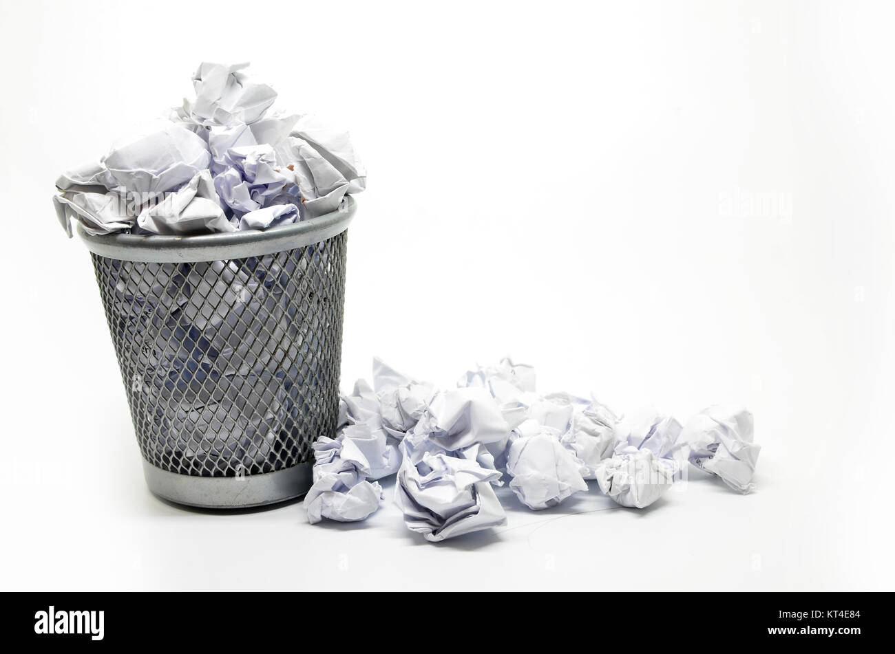 Garbage bin with paper waste Stock Photo - Alamy