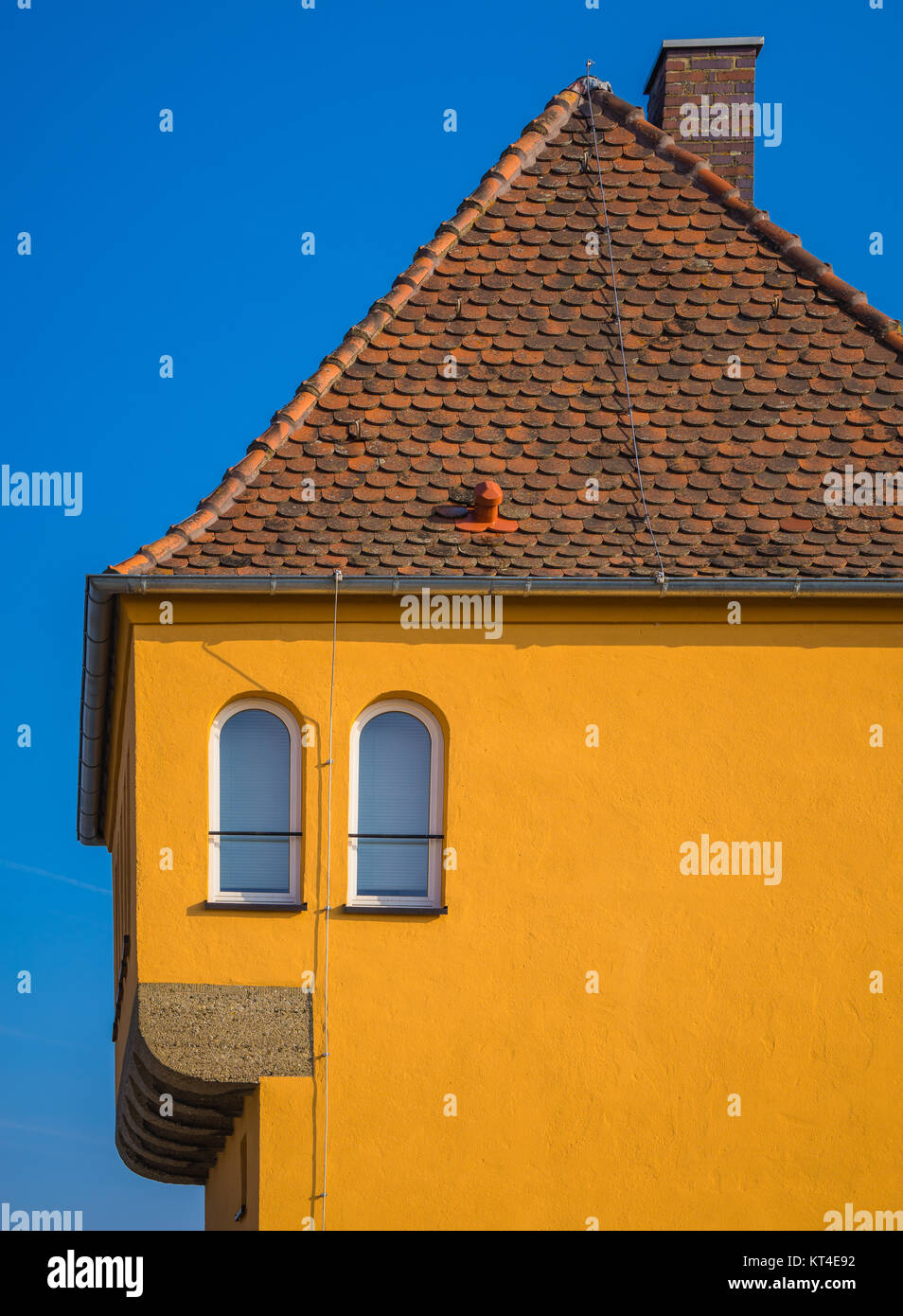 Yellow and abstract house shape Stock Photo - Alamy