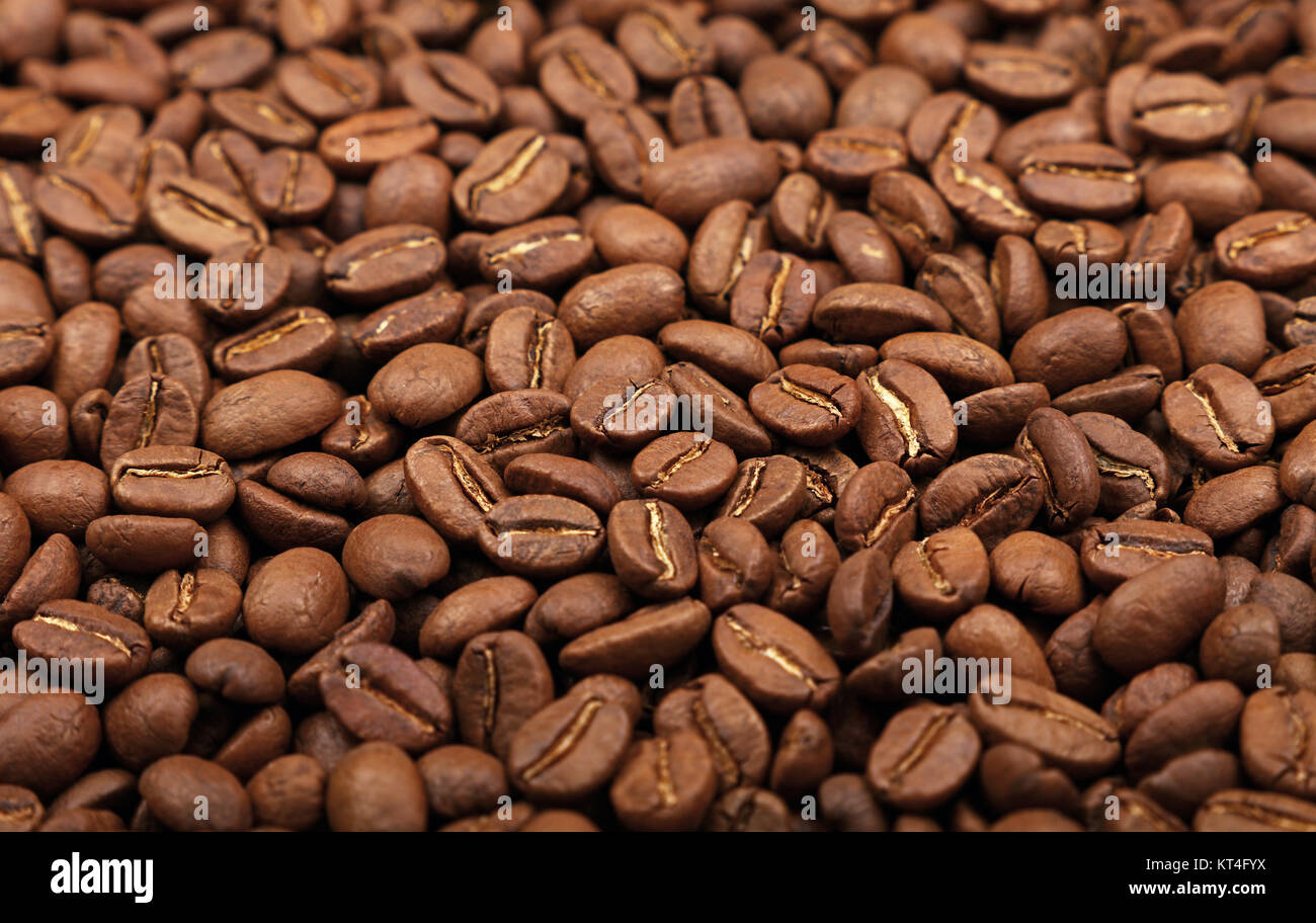 Roasted Arabica coffee beans background high angle Stock Photo - Alamy