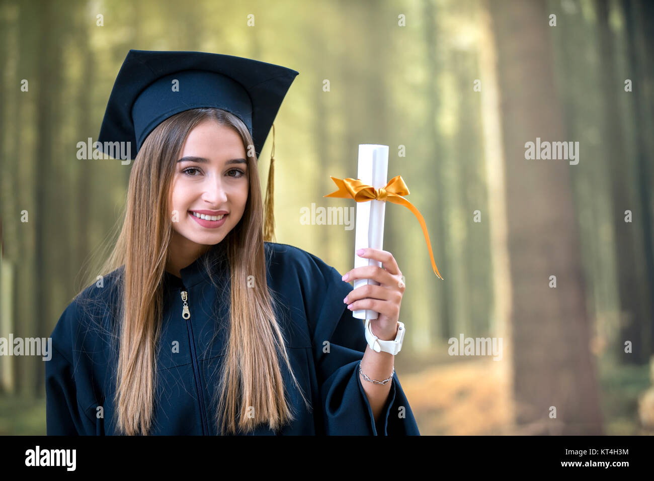 Graduation: Student Standing With Diploma Stock Photo - Alamy