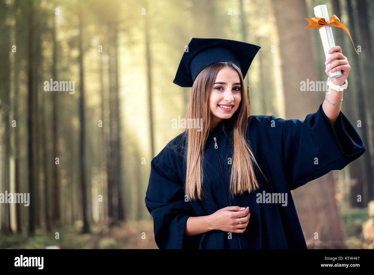 Graduation: Student Standing With Diploma Stock Photo - Alamy