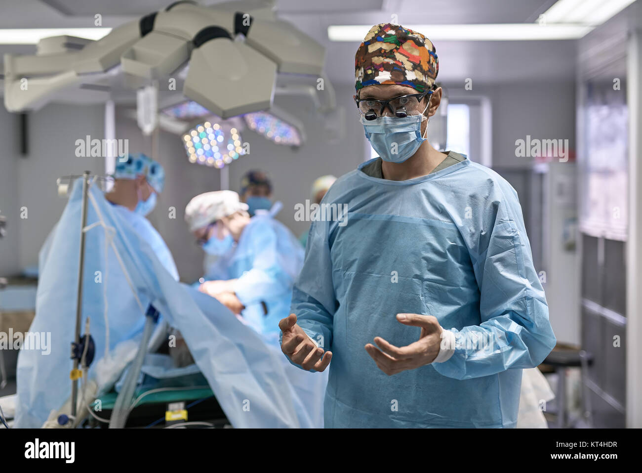 Doctors in operating room Stock Photo - Alamy