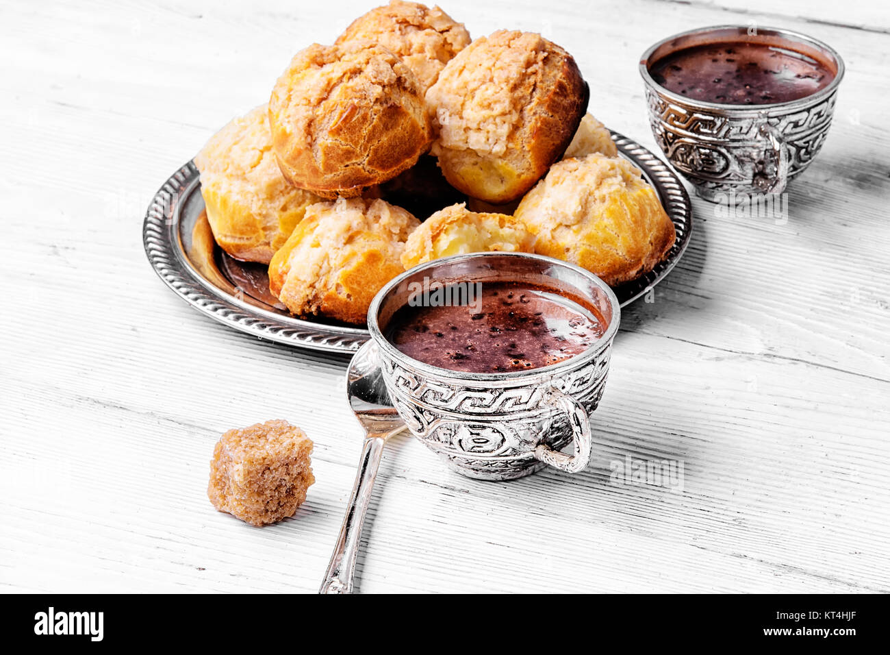 Homemade profiteroles dessert and cup hot chocolate Stock Photo - Alamy