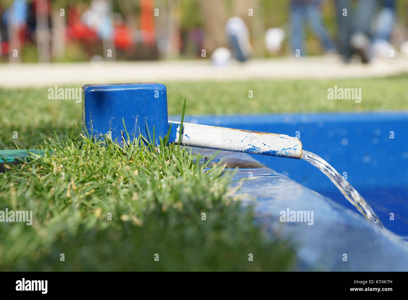detail from open air swimming pool,steel tap with running water Stock ...
