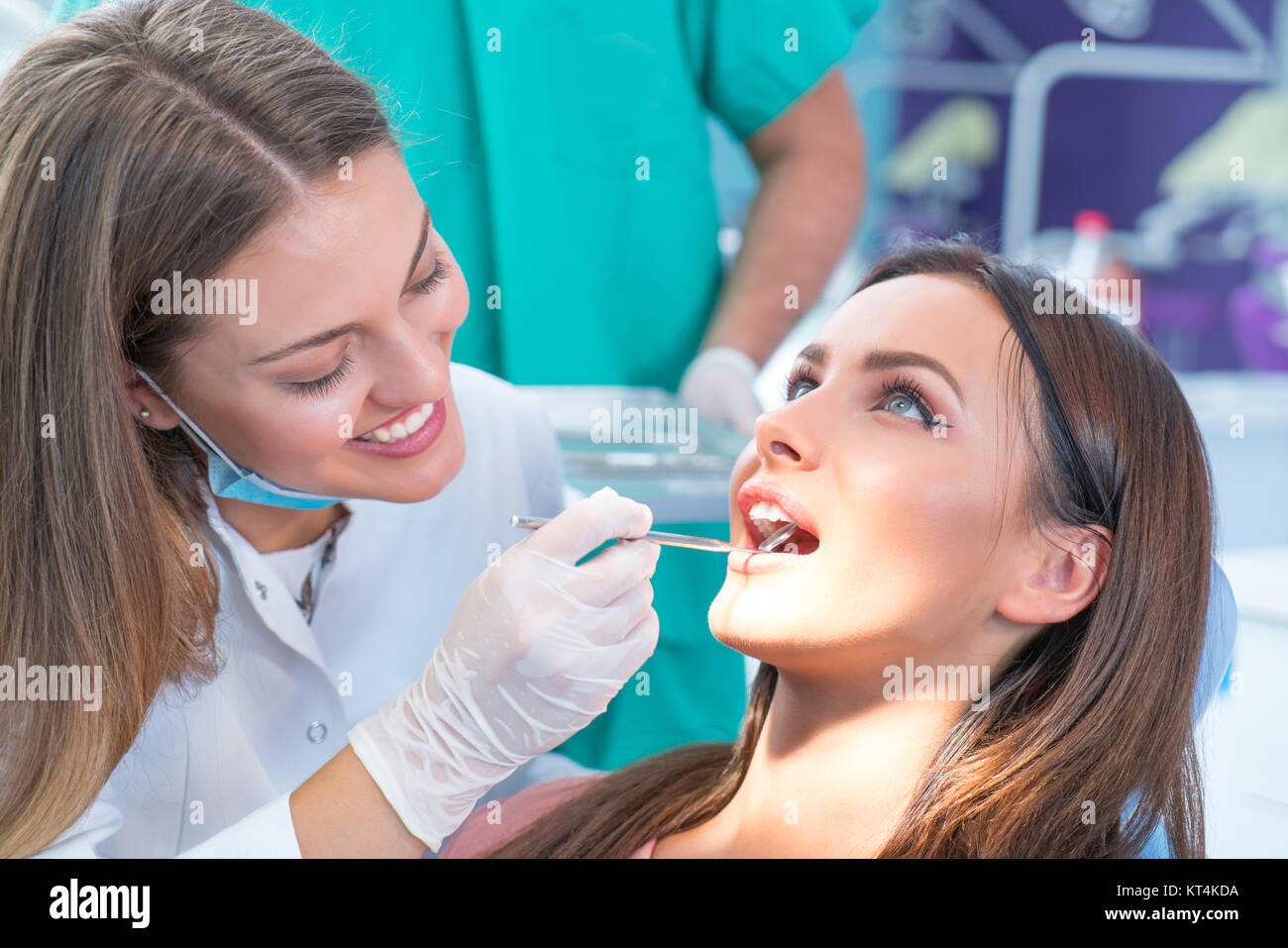 Doctor talking with her patient. Dentist concept Stock Photo - Alamy