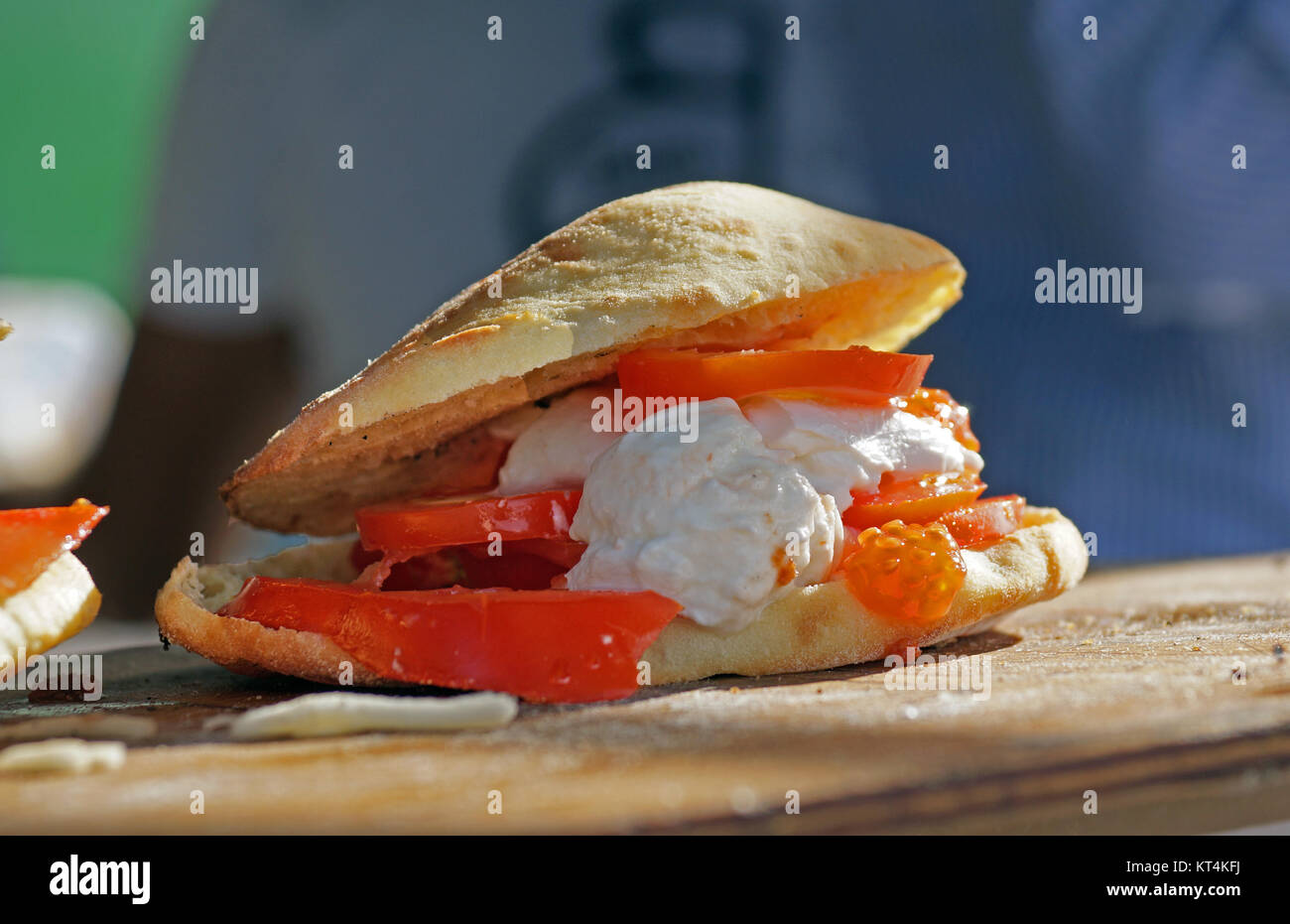 sandwich grab .hamburger with pork,beef,and vegetables is in the bread ...