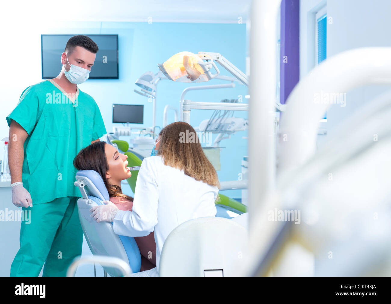 Doctor talking with her patient. Dentist concept Stock Photo - Alamy