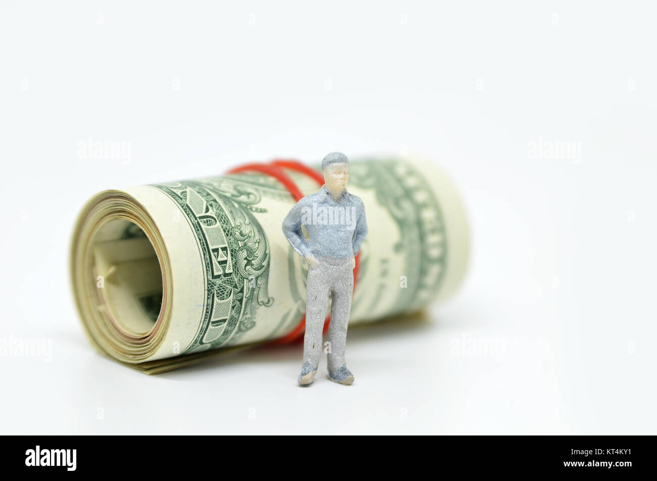 Figure of businessman and one dollar bill Stock Photo - Alamy