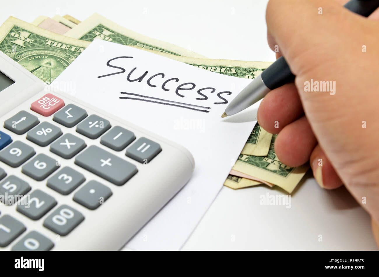 Hand written success word on paper Stock Photo - Alamy