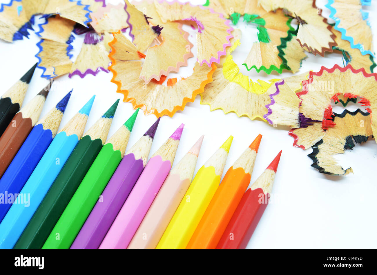 Sharpened color pencil and wood shavings Stock Photo - Alamy