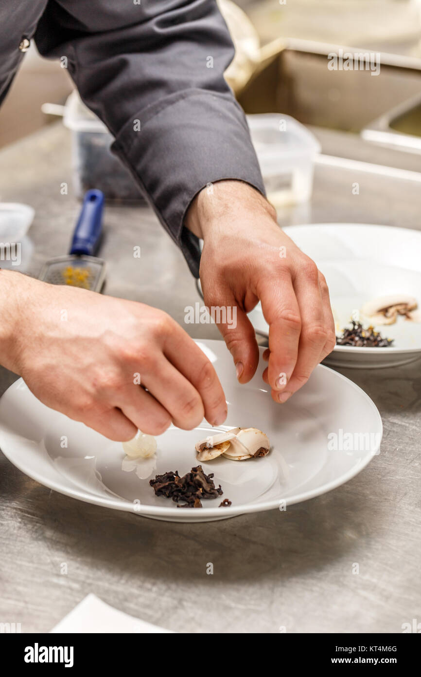Male cooks preparing meals Stock Photo - Alamy