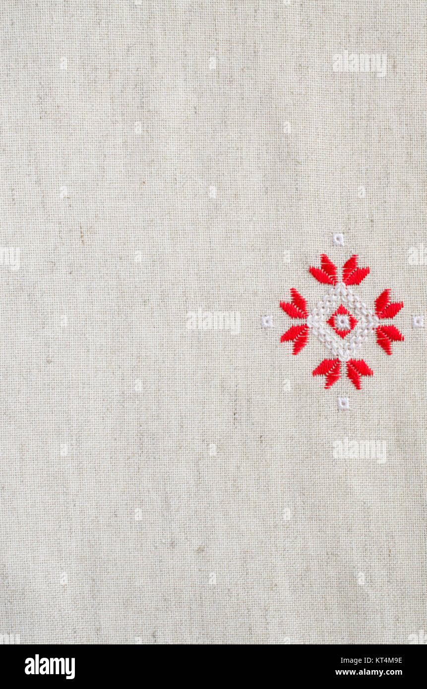 Texture of homespun linen textile with embroidery Stock Photo - Alamy