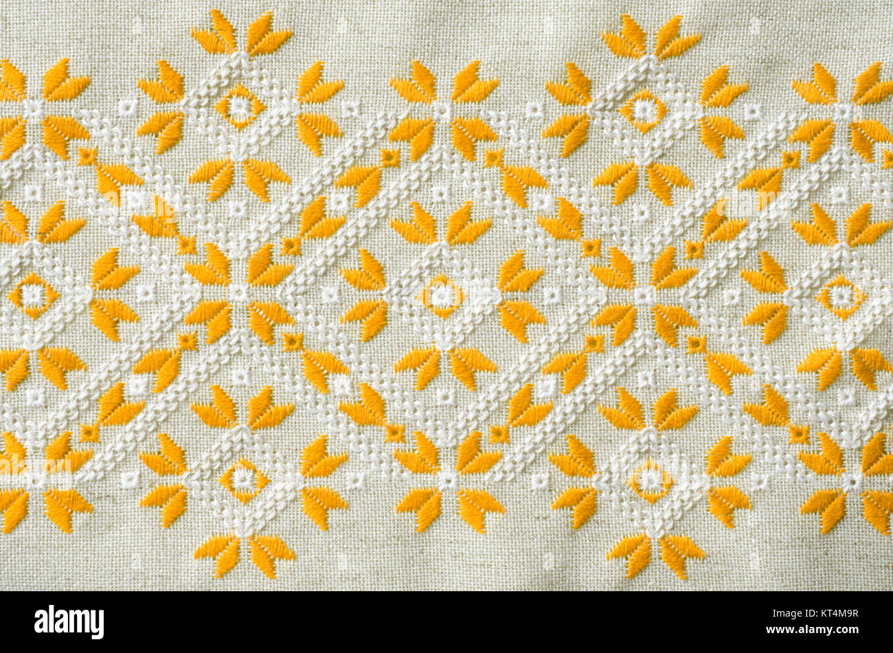 Texture of homespun linen textile with embroidery Stock Photo - Alamy