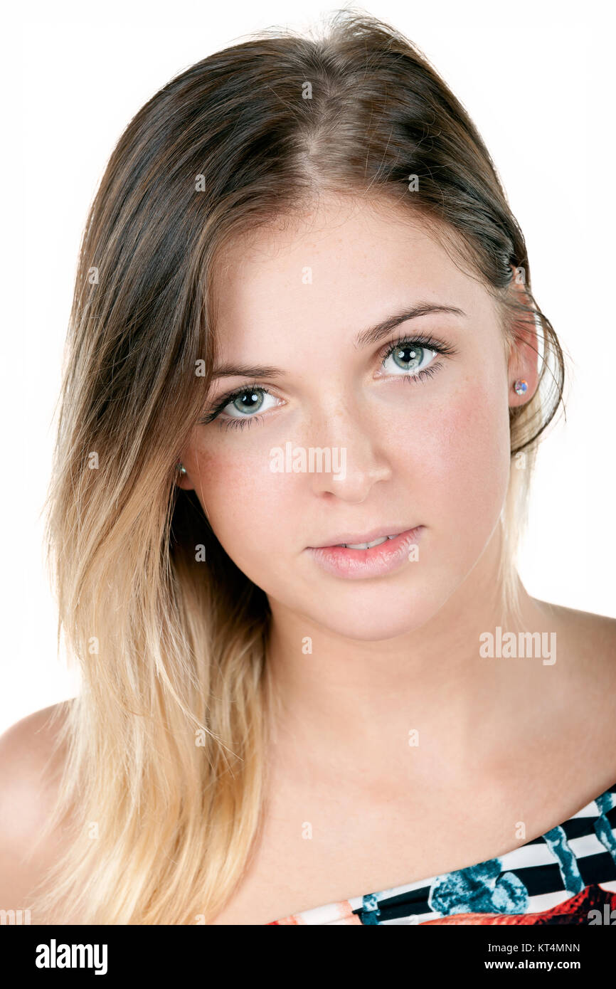 Studio portrait of a 16 years old gorgeous teenager girl over white ...