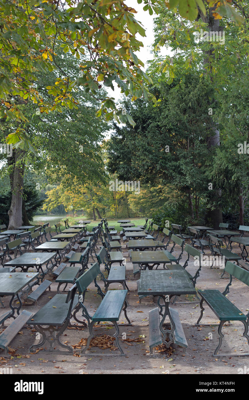 tables and chairs in a park Stock Photo - Alamy