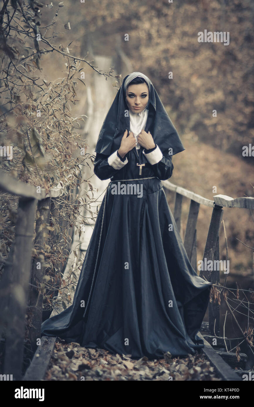 Beautiful, mysterious conventual nun.Beautiful, mysterious conventual ...