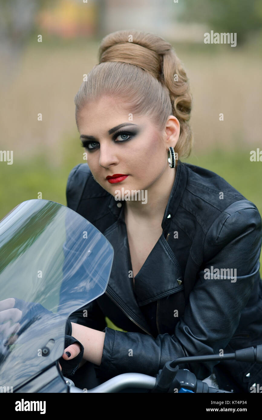 Stunning,fashionable,dangerous,angry,serious biker girl with smokey ...