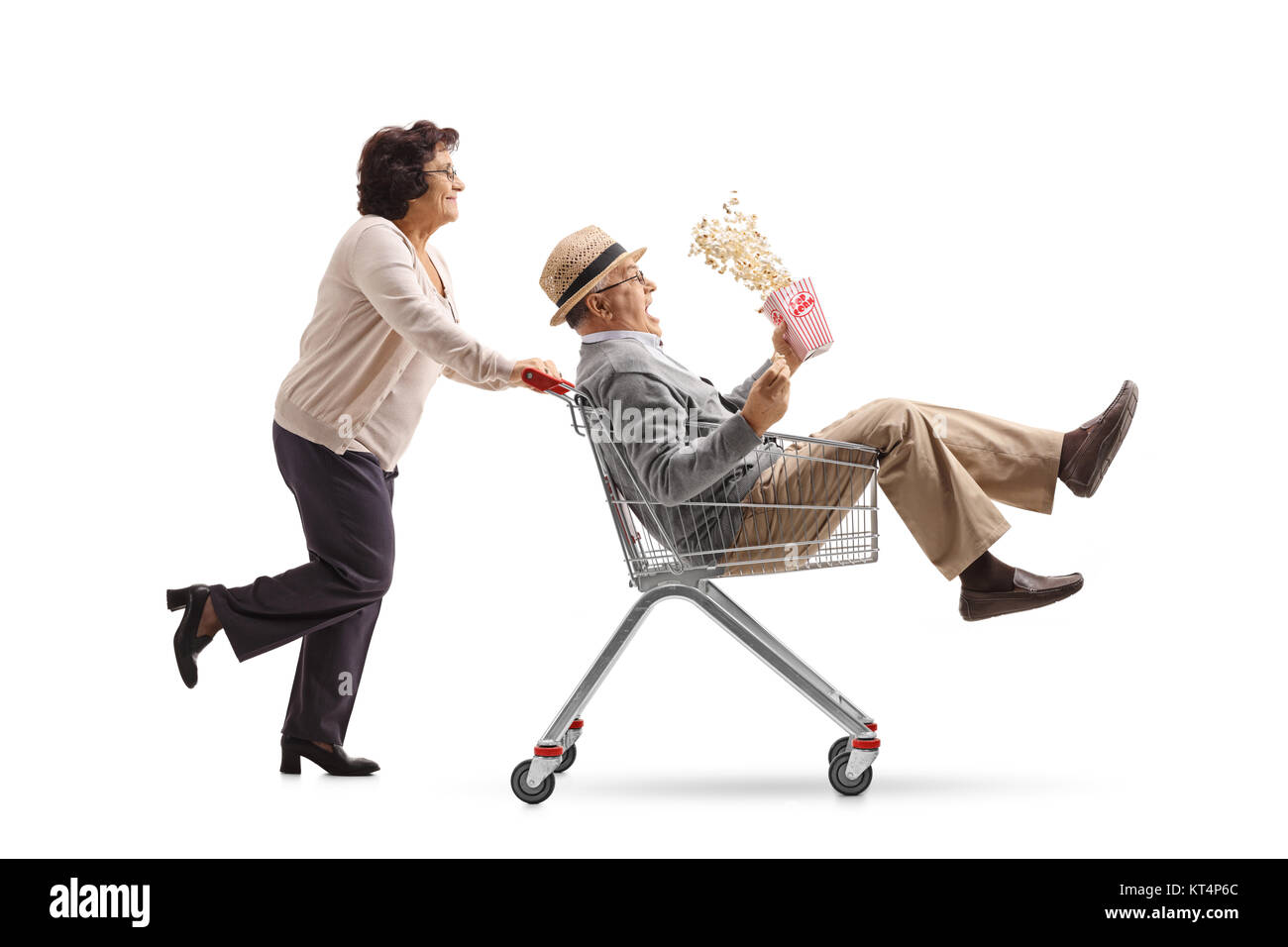 Old lady pushing trolley hi-res stock photography and images - Alamy