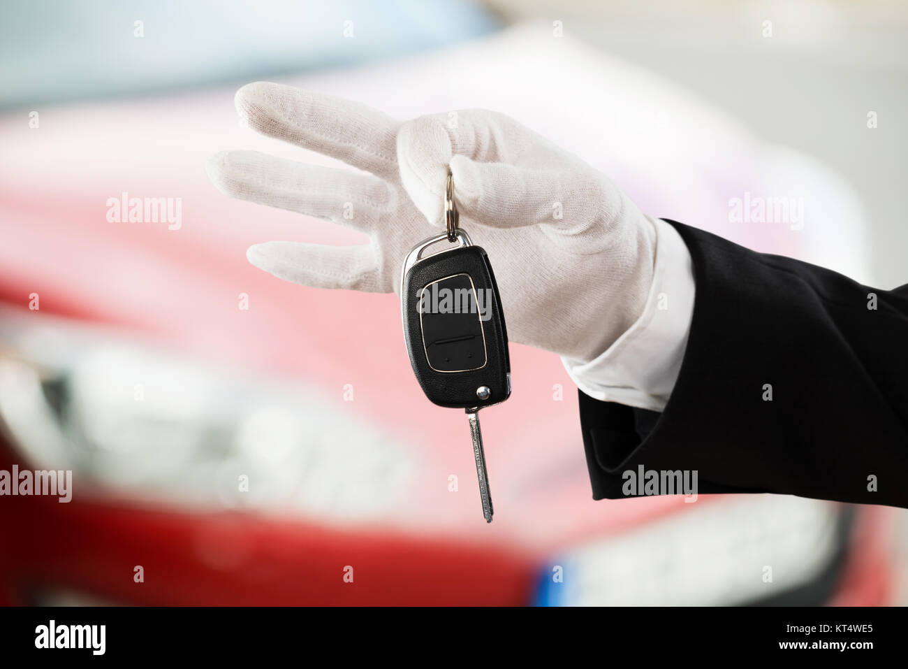 Valet Boy Hand Holding Car Key Stock Photo - Alamy