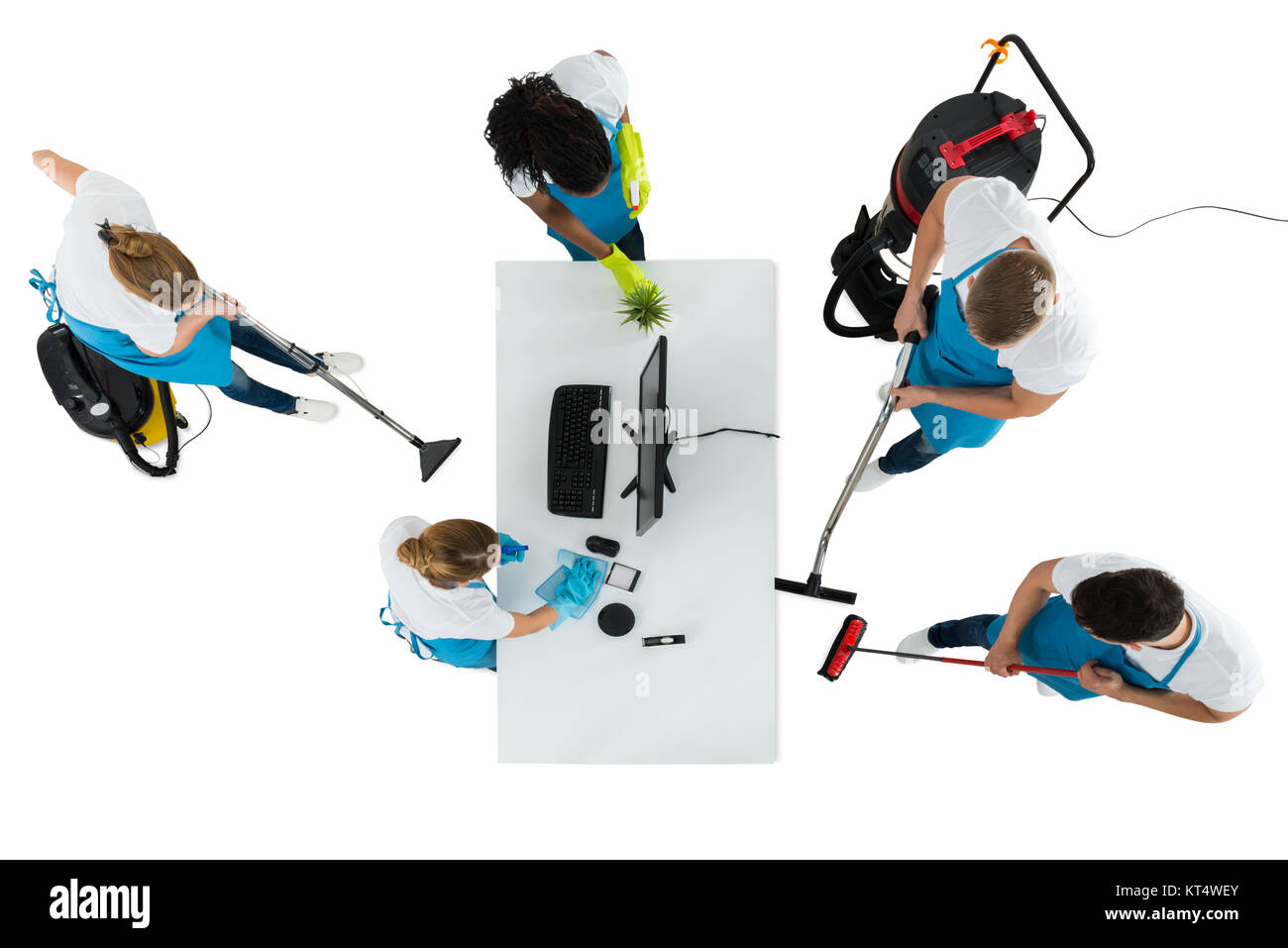 Group Of Janitors Cleaning Office Stock Photo - Alamy