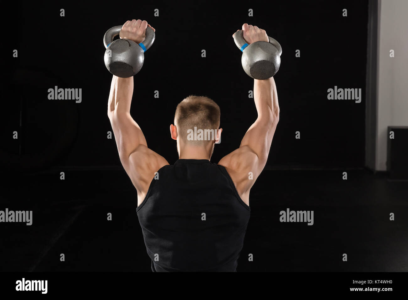 Man Doing Exercise With Kettle Bell Stock Photo - Alamy