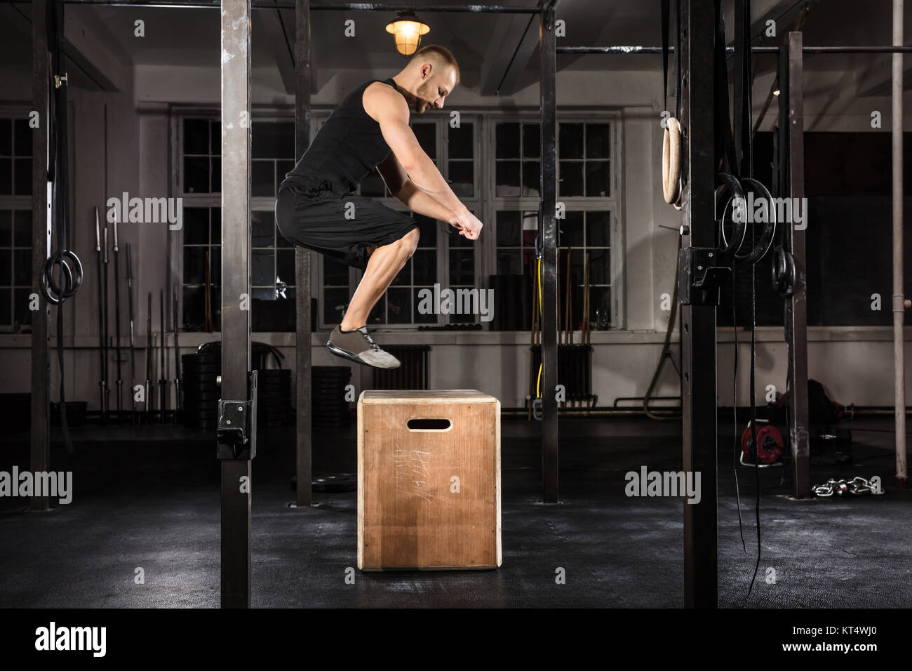 Jumping young man boxes hi-res stock photography and images - Alamy