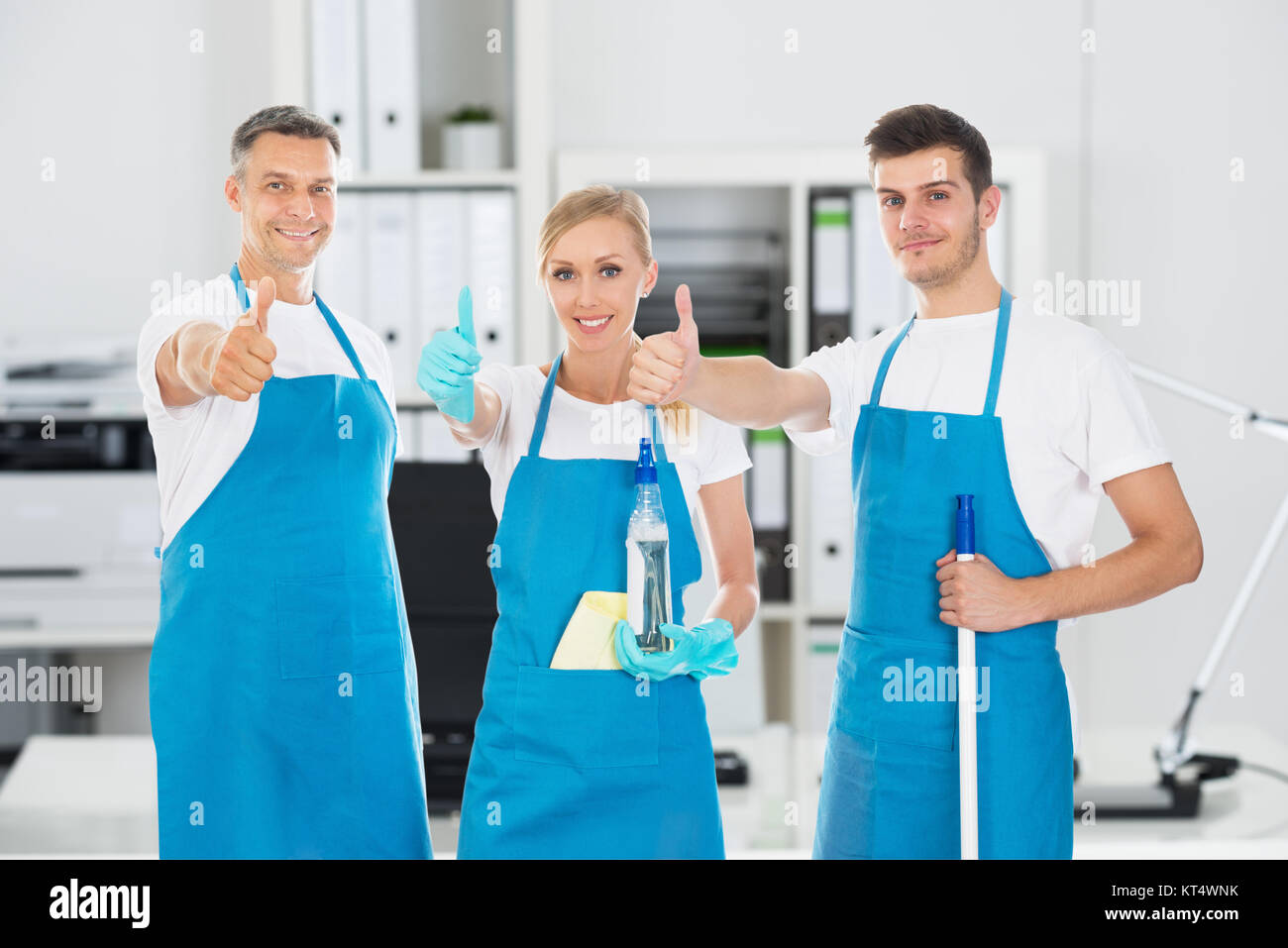 Portrait Of Smiling Janitors Stock Photo - Alamy