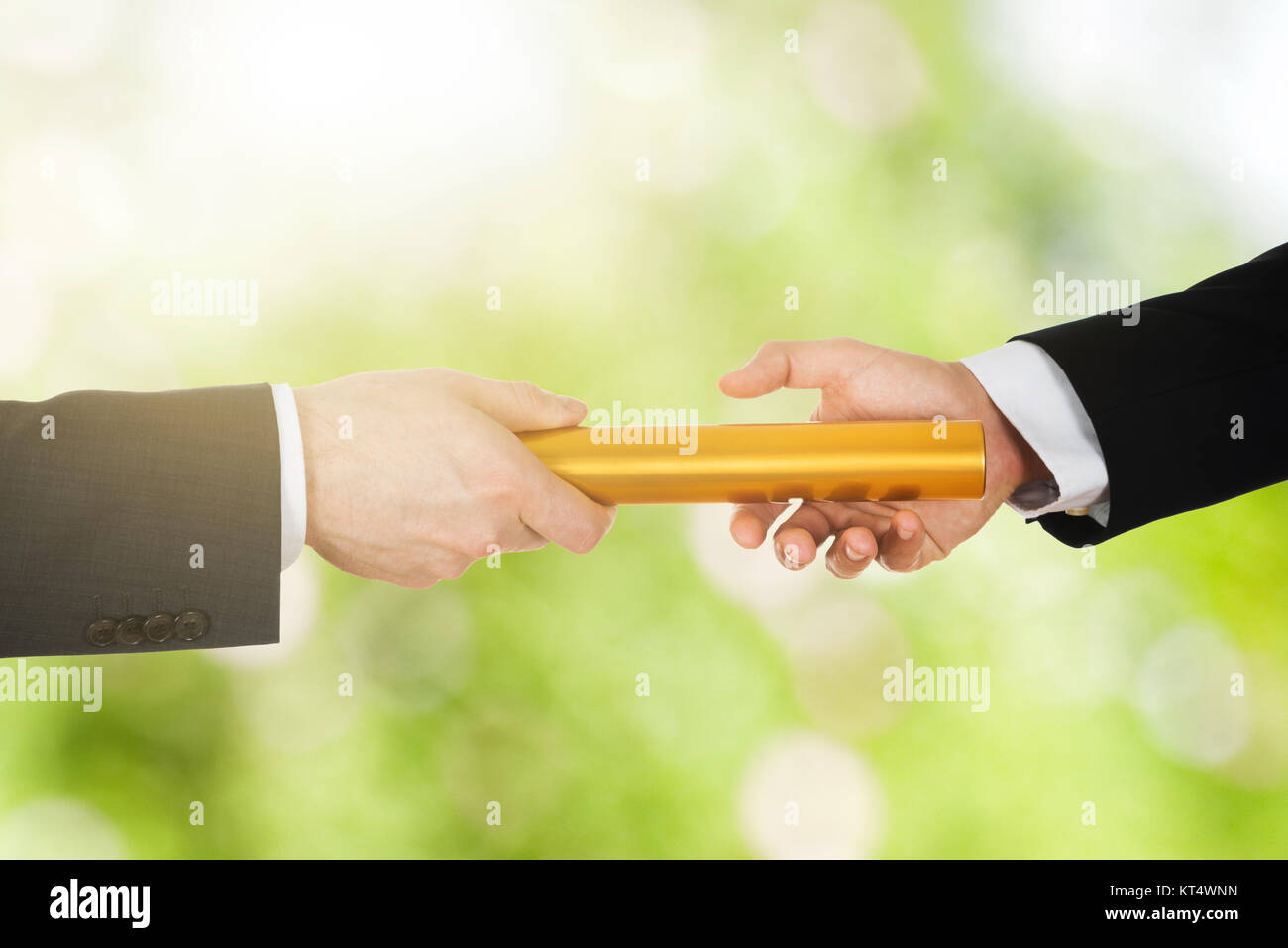 Human hand holding baton hi-res stock photography and images - Alamy