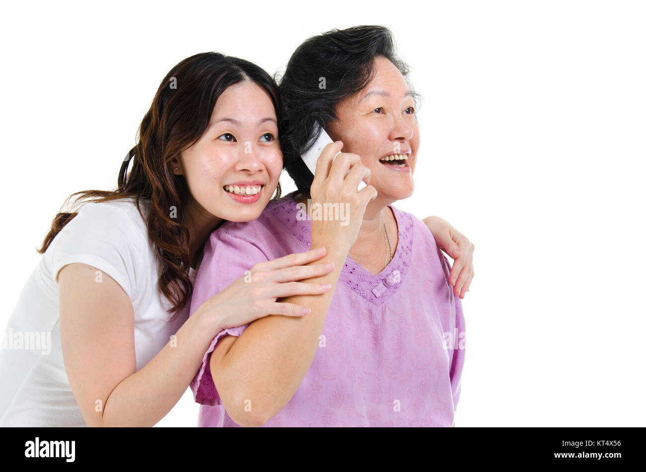 Mother and daughter calling on phone Stock Photo - Alamy