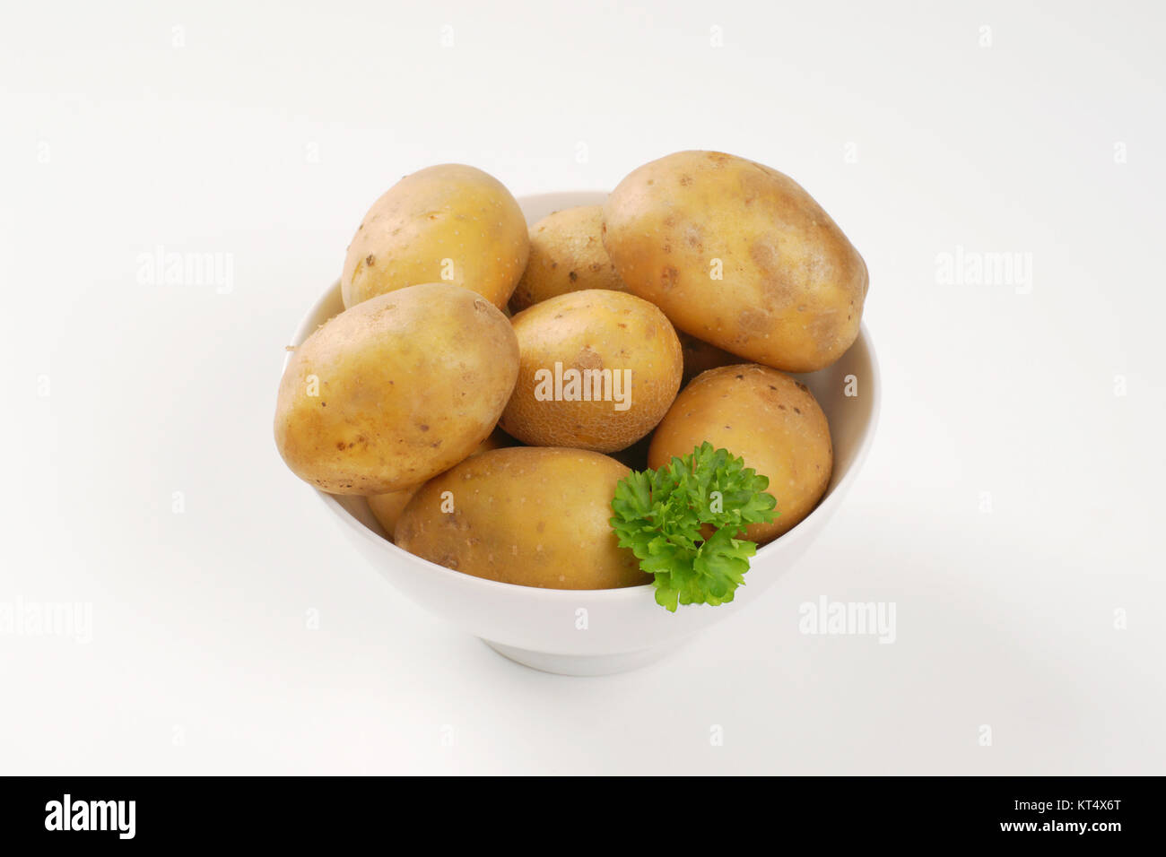 raw unpeeled potatoes Stock Photo - Alamy