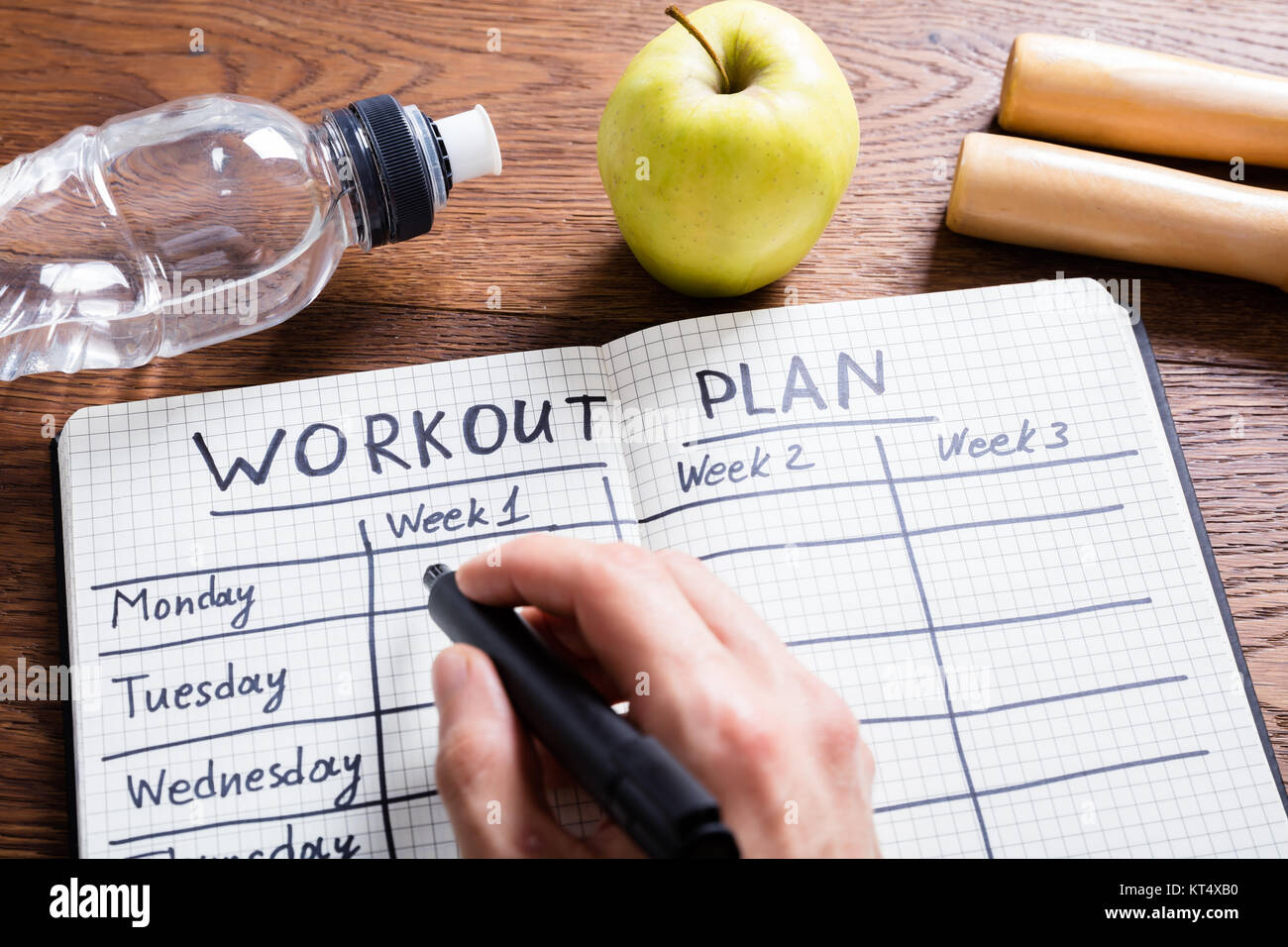 Workout Plan In Notebook Stock Photo - Alamy