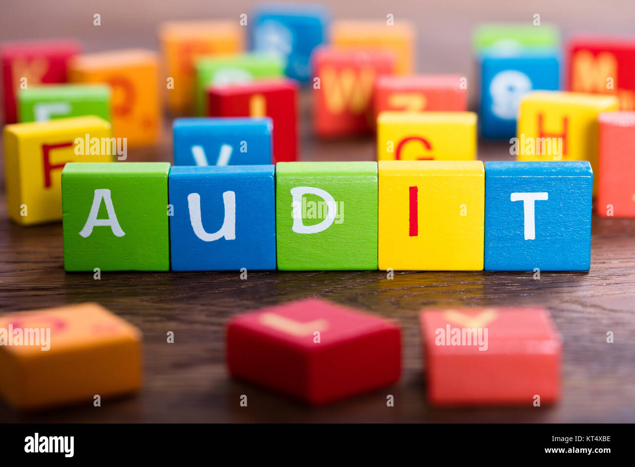 An Audit Concept On Colorful Blocks Stock Photo - Alamy